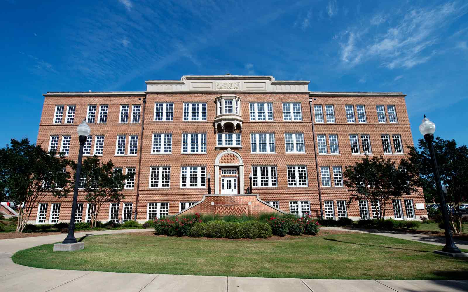 Sidewalk, parking area south of Lloyd-Ricks-Watson Building closes ...